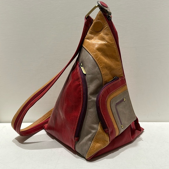 Cirque Du Soleil | Bags | Cirque Du Soleil Red Grey Tan Leather Triangular Backpack | Poshmark